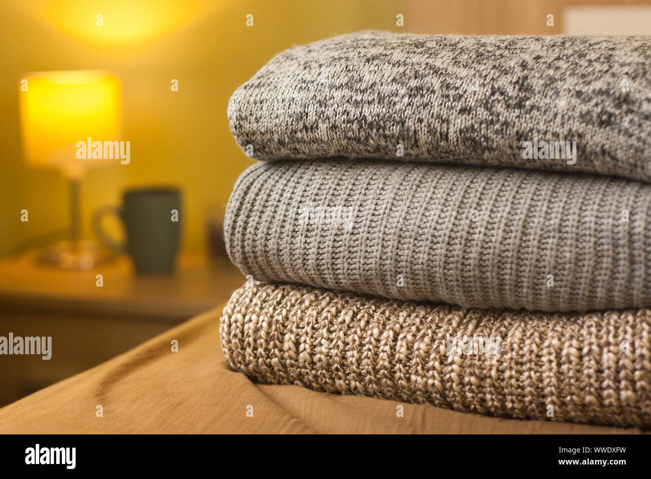 Sweaters in pile hi-res stock photography and images - Alamy