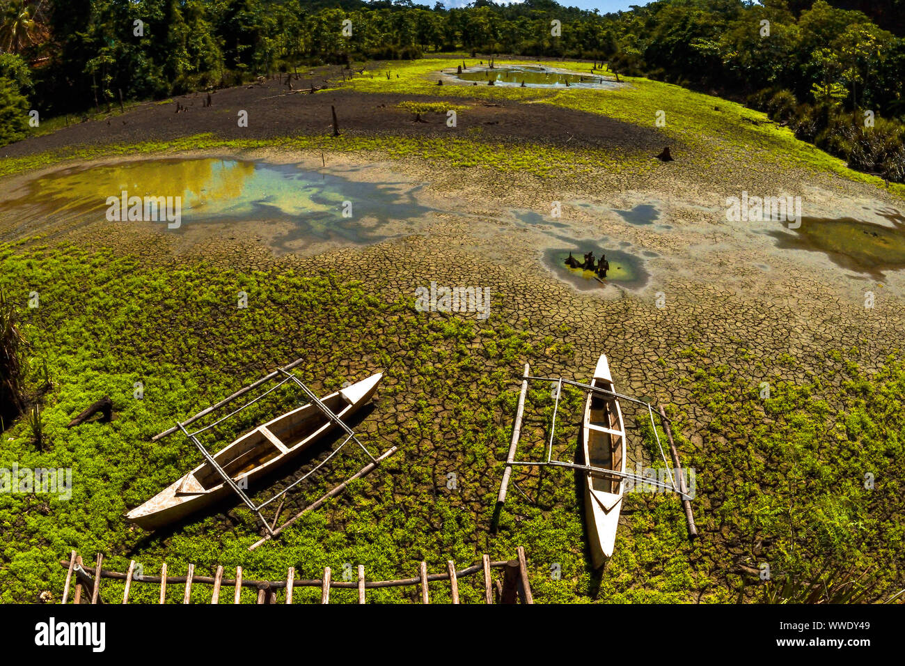 dry river with boat Stock Photo - Alamy