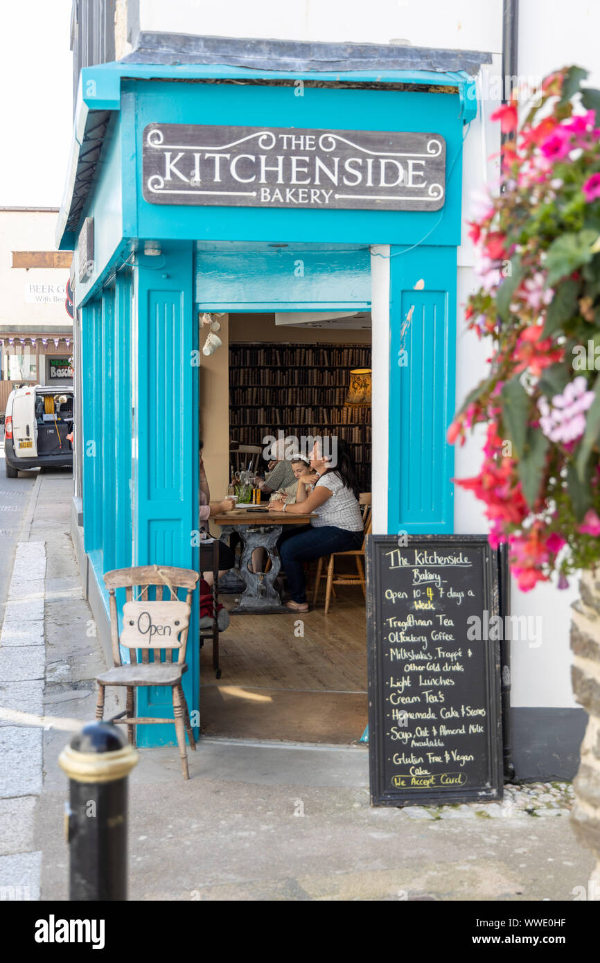 customers inside the kitchen side bakery, Looe, Cornwall Stock Photo ...
