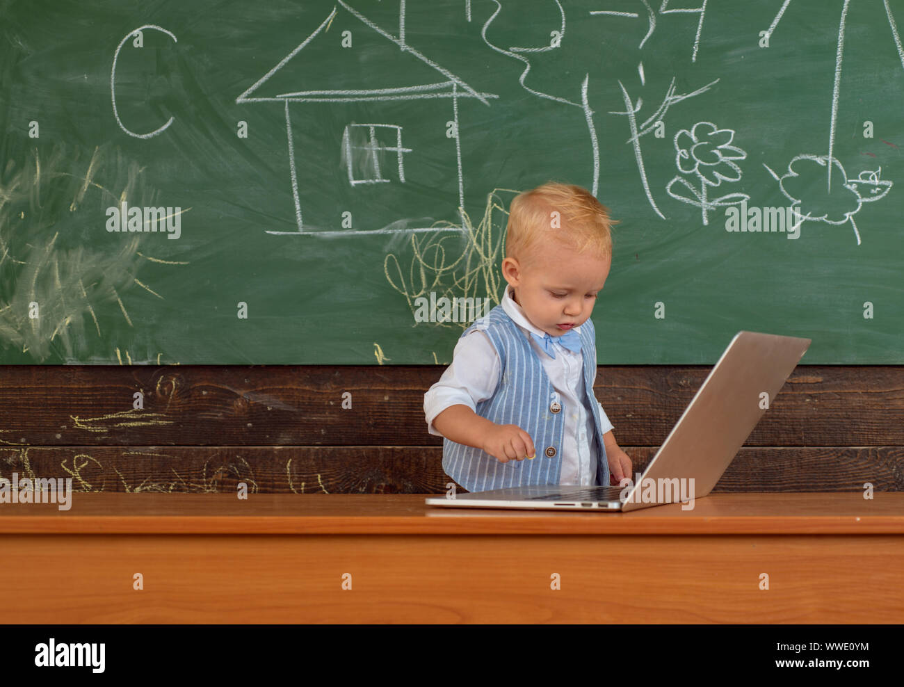 Genius toddler boy use new technology in primary school. Genius child ...