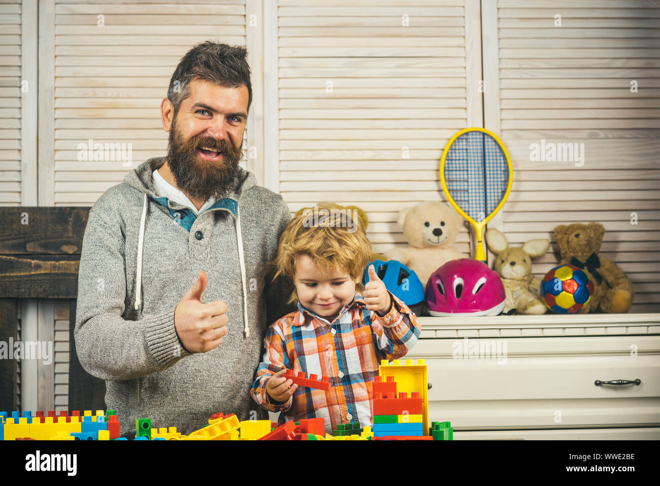 Little boy together with father. father and small child play with ...