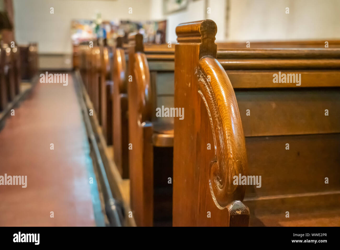 End of wooden pews in church Stock Photo - Alamy