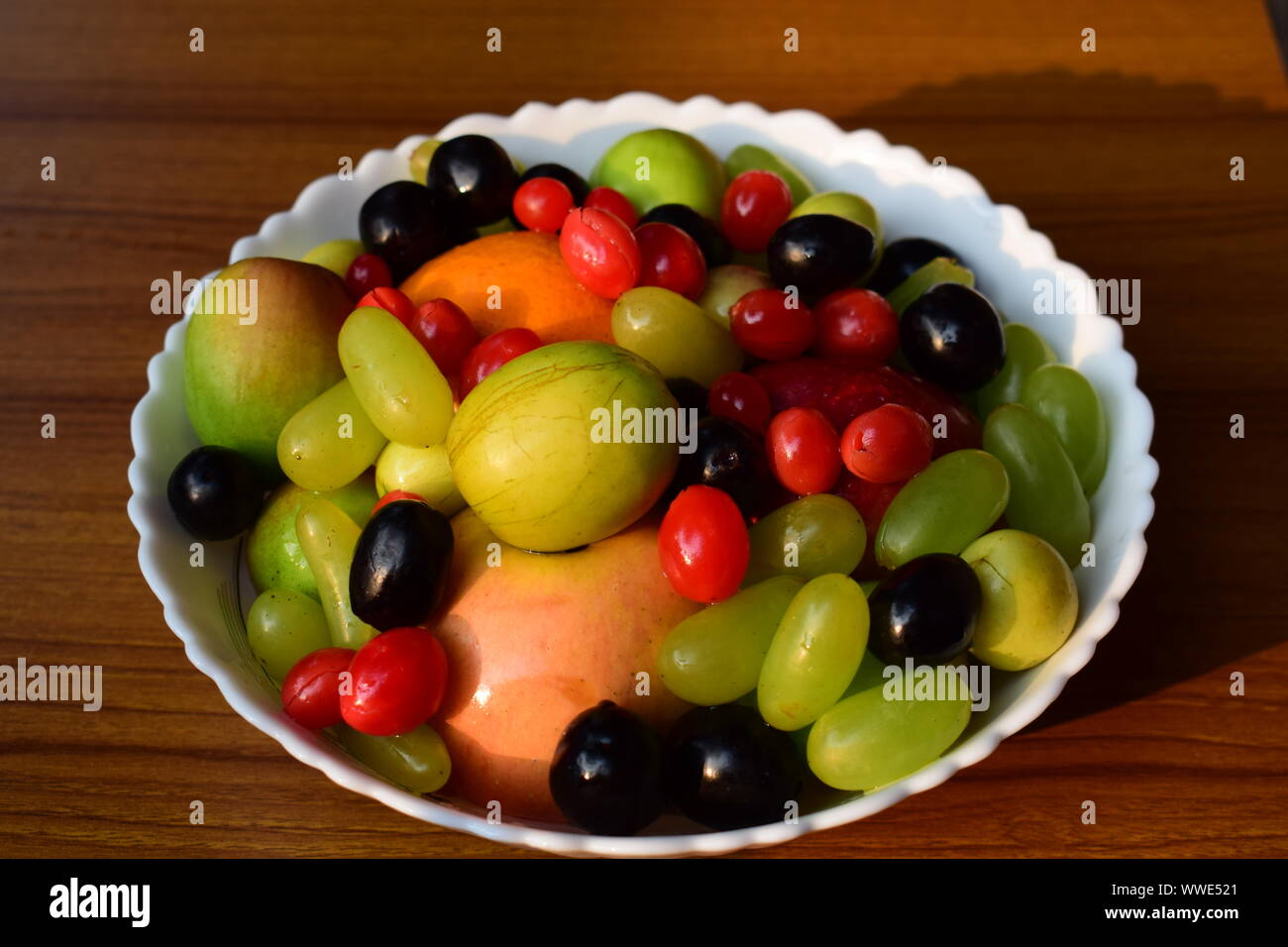 Beautiful coloured tasty natural fruits Stock Photo - Alamy