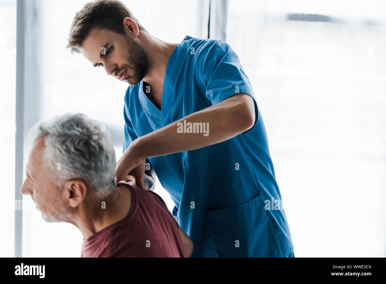 Touching shoulder hi-res stock photography and images - Alamy