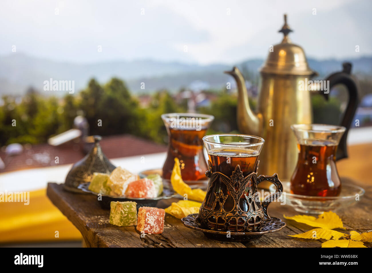 Glass Cup of turkish tea served in traditional style with summer ...