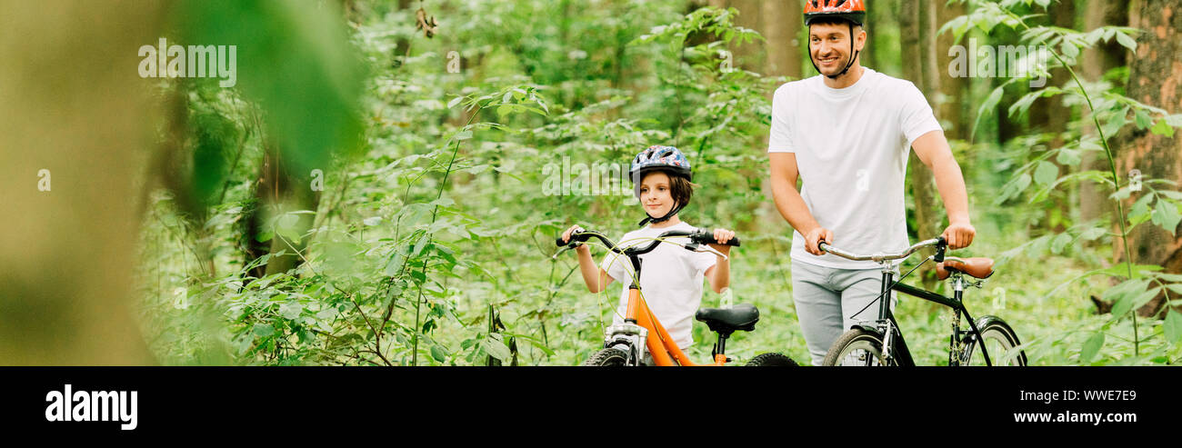 Father son helmets hi-res stock photography and images - Alamy