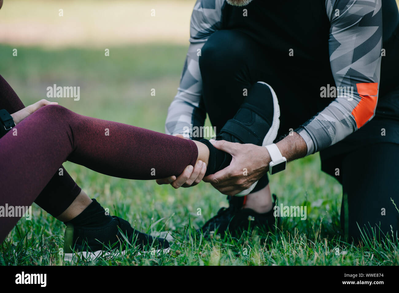 Mature woman touching leg hi-res stock photography and images - Alamy