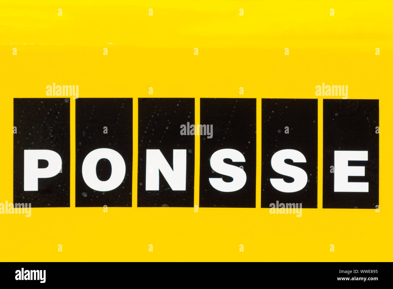 Ponsse logo on yellow background Stock Photo - Alamy
