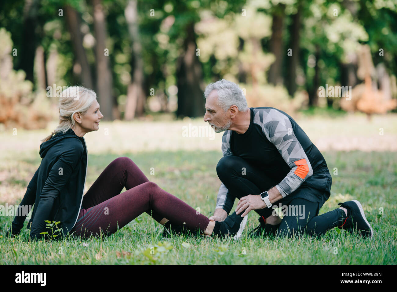 Man touching woman leg hi-res stock photography and images - Alamy