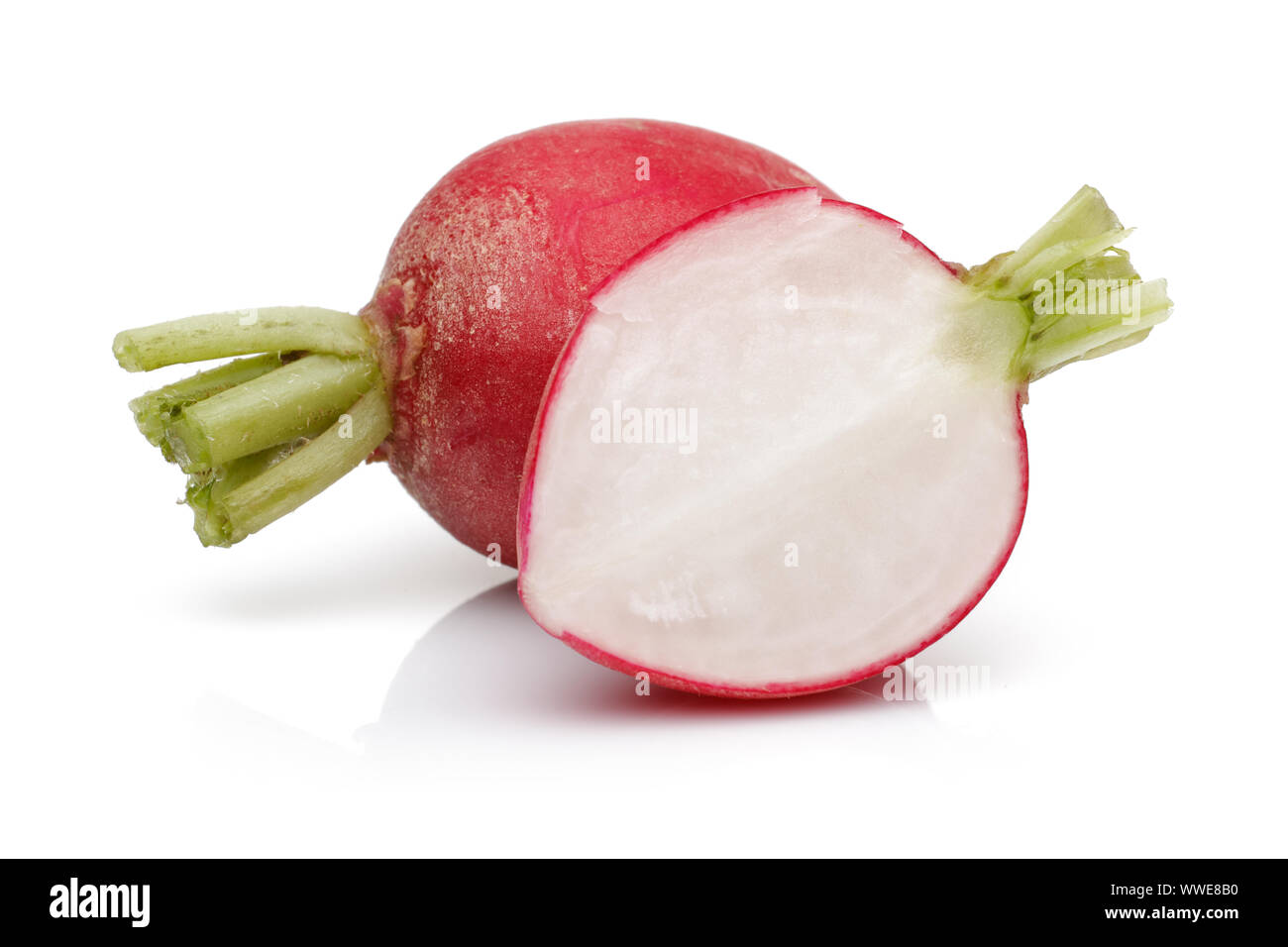 Half and whole red radish isolated on white background Stock Photo - Alamy