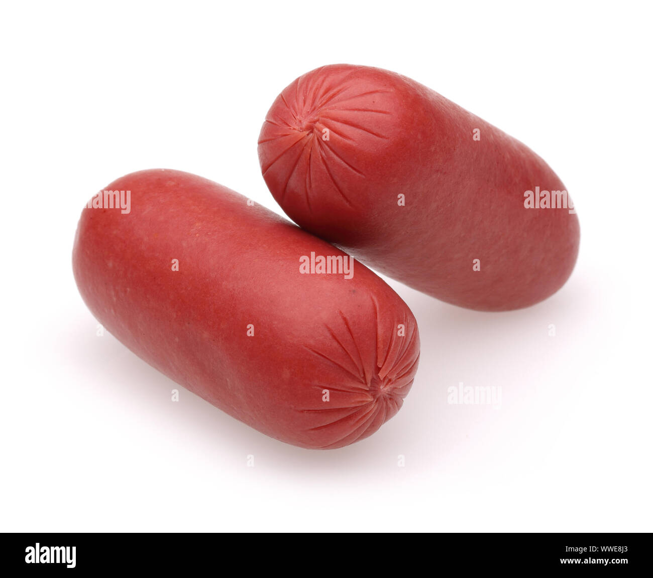 Whole small sausages isolated on white background Stock Photo - Alamy
