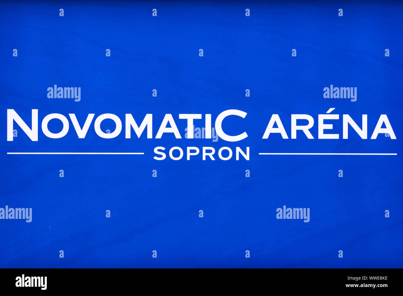 Novomatic Arena Sopron logo on back lit window pane, Sopron, Hungary ...