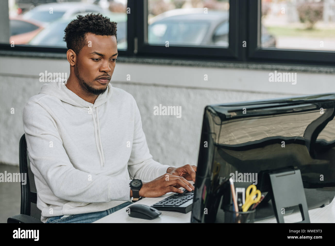 African american coder using hi-res stock photography and images - Alamy