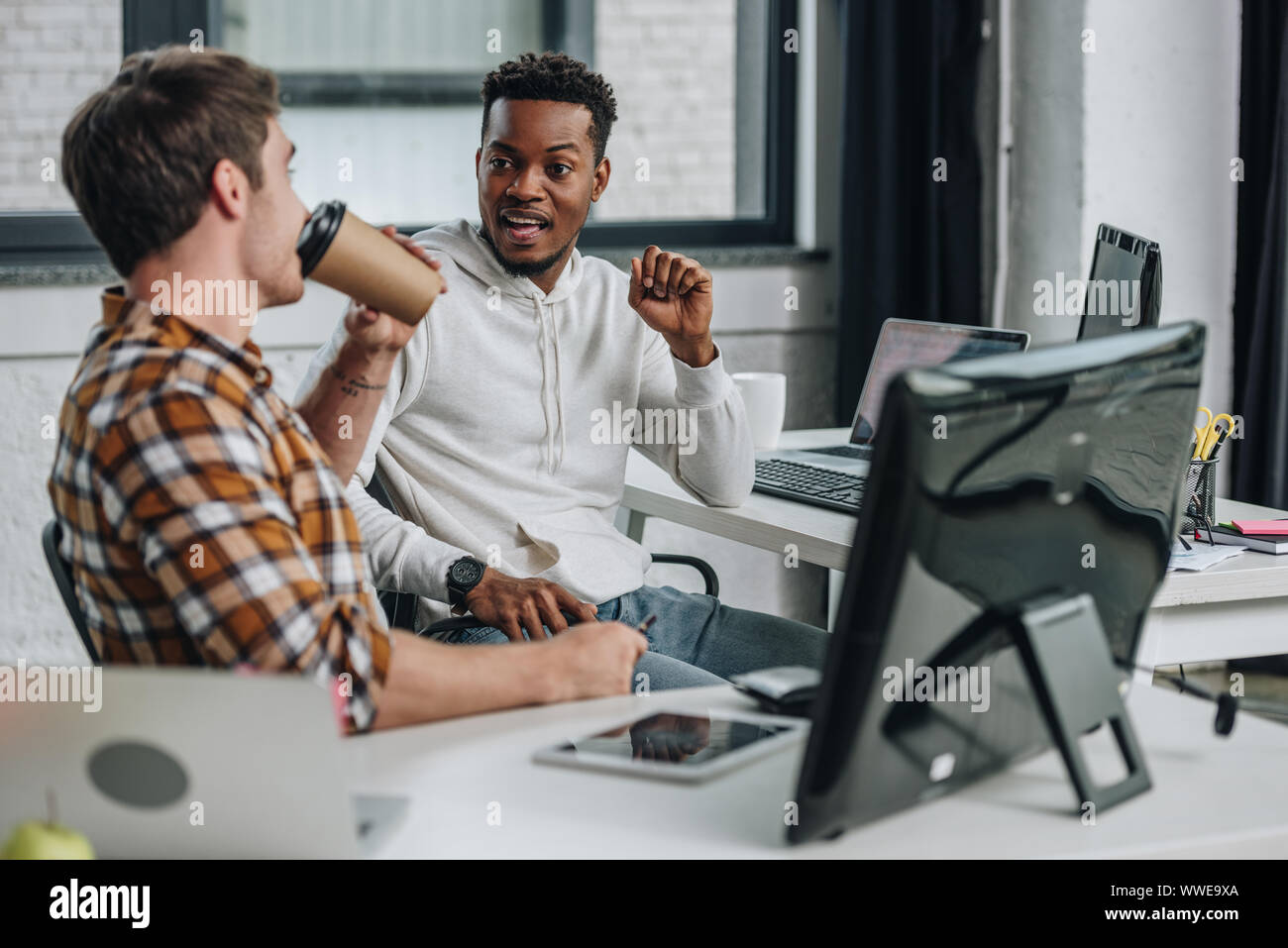 Team young programmers gadgets hi-res stock photography and images - Alamy