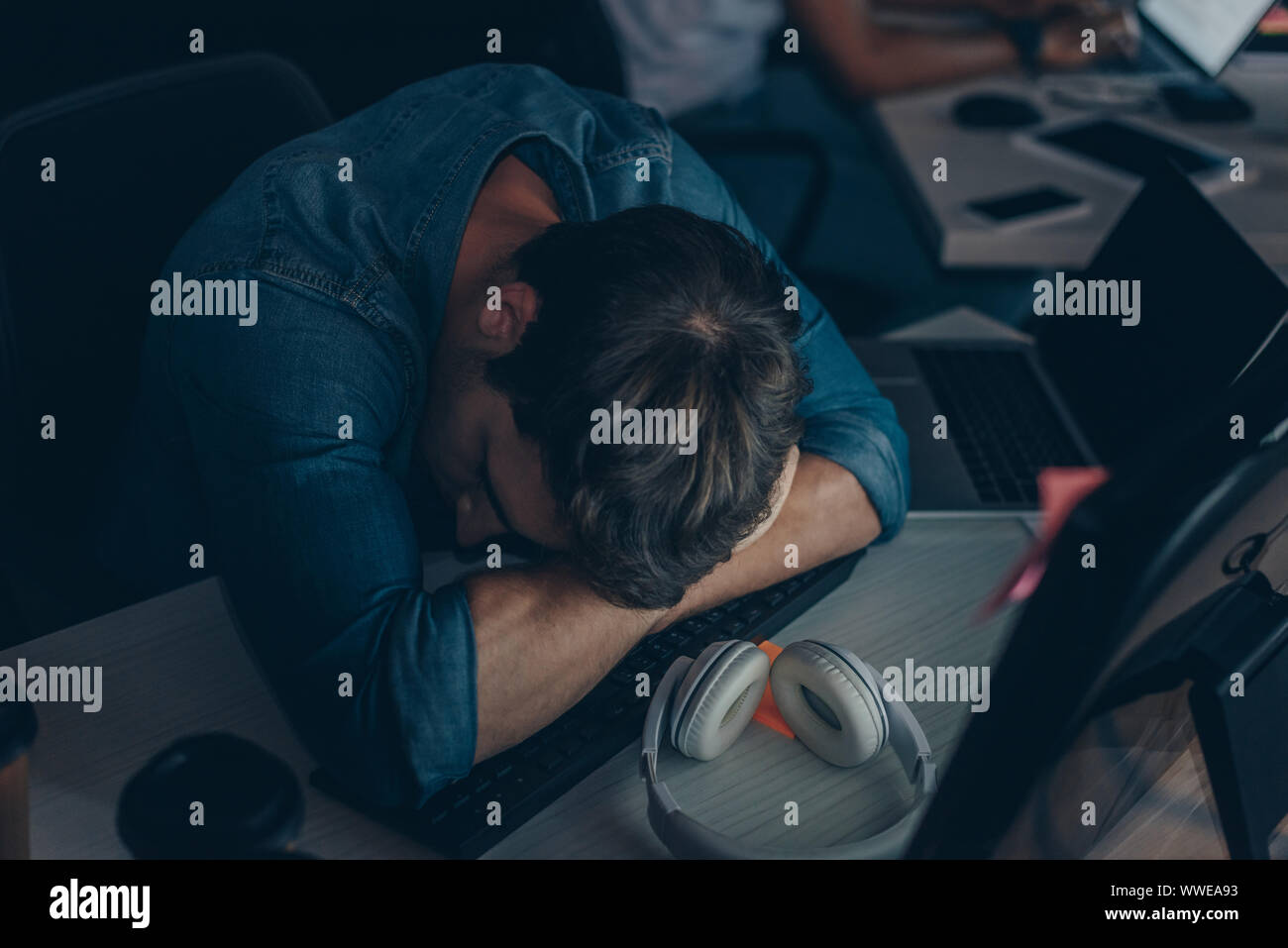Man sleeping keyboard in computer hi-res stock photography and images ...
