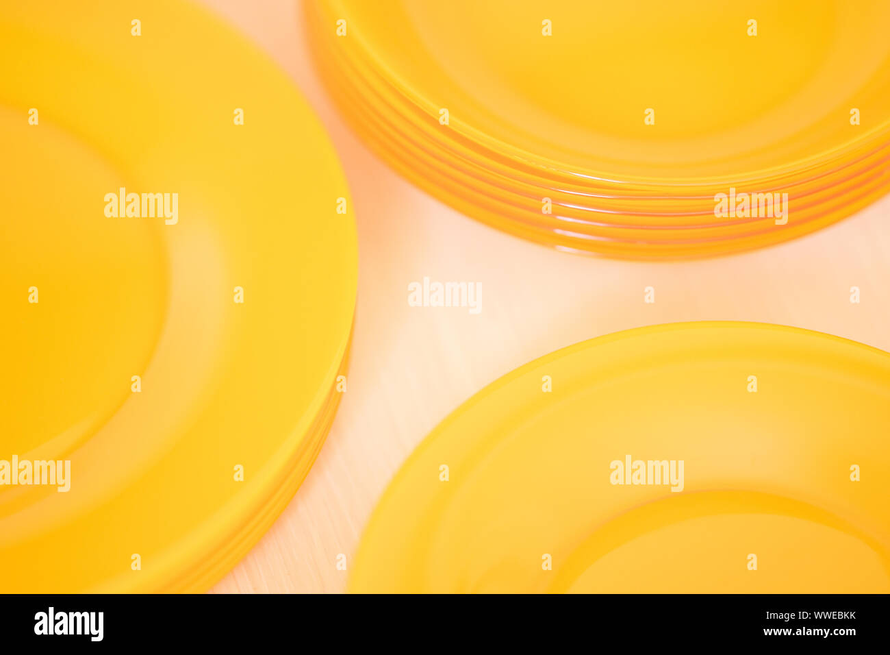 orange plates in a wooden box closeup, top view Stock Photo - Alamy