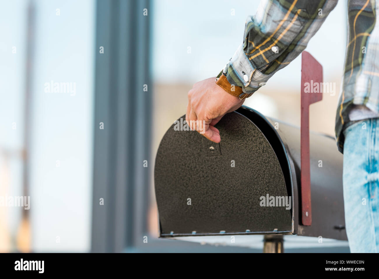 Man opening mailbox hi-res stock photography and images - Alamy