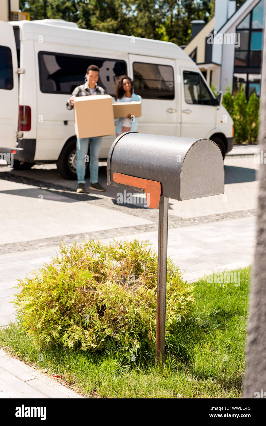 Couple outside house car hi-res stock photography and images - Alamy