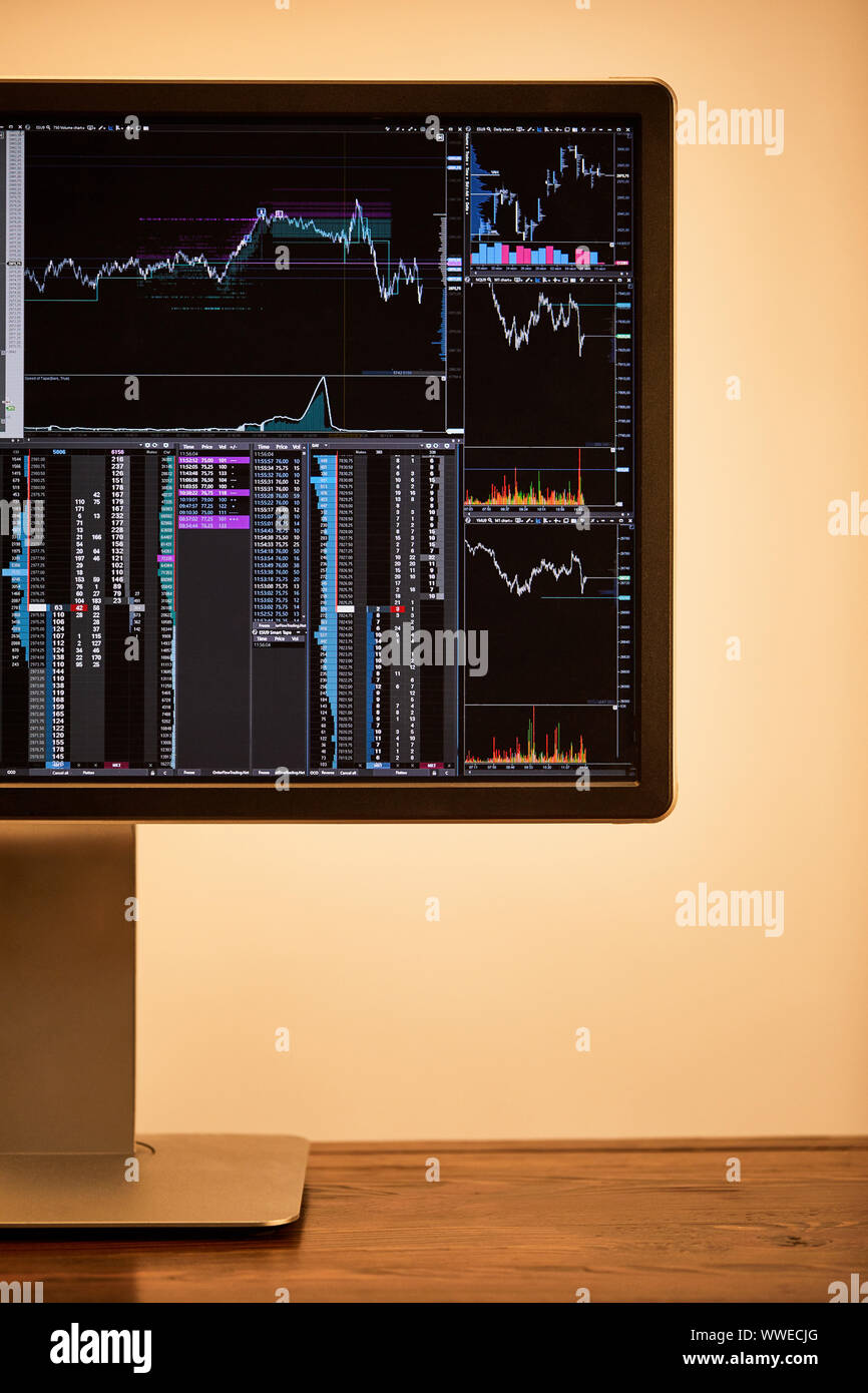 screen of digital device with charts and graphs in office Stock Photo ...