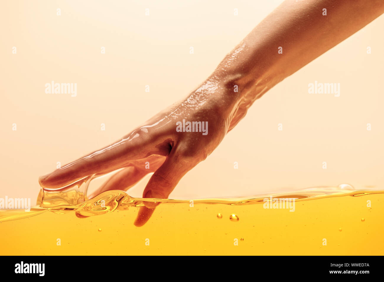 Hand touching surface water hi-res stock photography and images - Alamy
