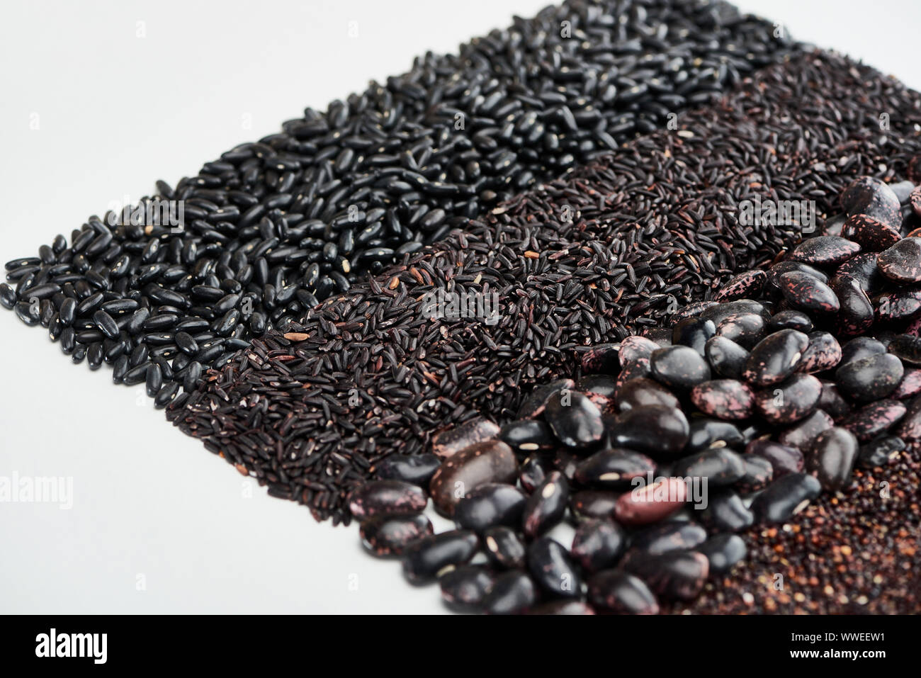 assorted black beans, quinoa and rice isolated on white Stock Photo - Alamy