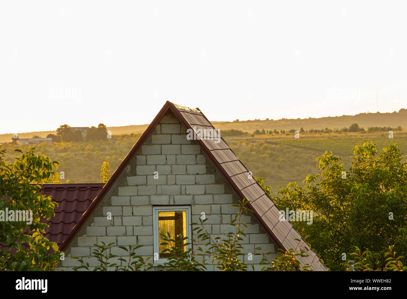 An unfinished house on the edge. Beautiful countryside Stock Photo - Alamy