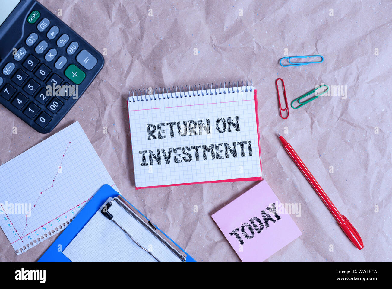 Writing note showing Return On Investment. Business concept for ...