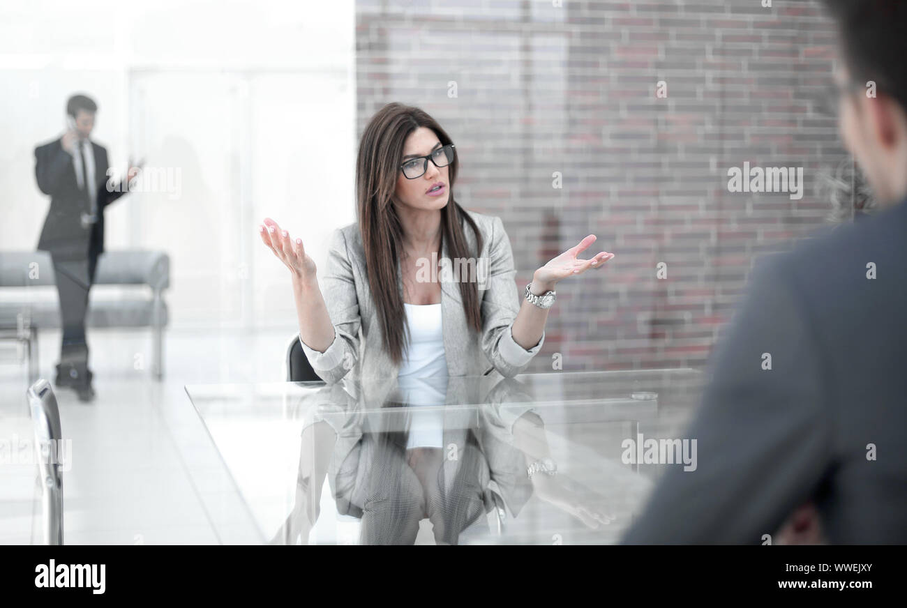 business woman talking to a client in a Bank office Stock Photo - Alamy