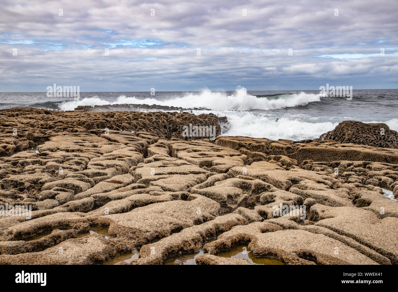 Harbour beach with waves and rocks, Doolin, Clare, Ireland Stock Photo ...