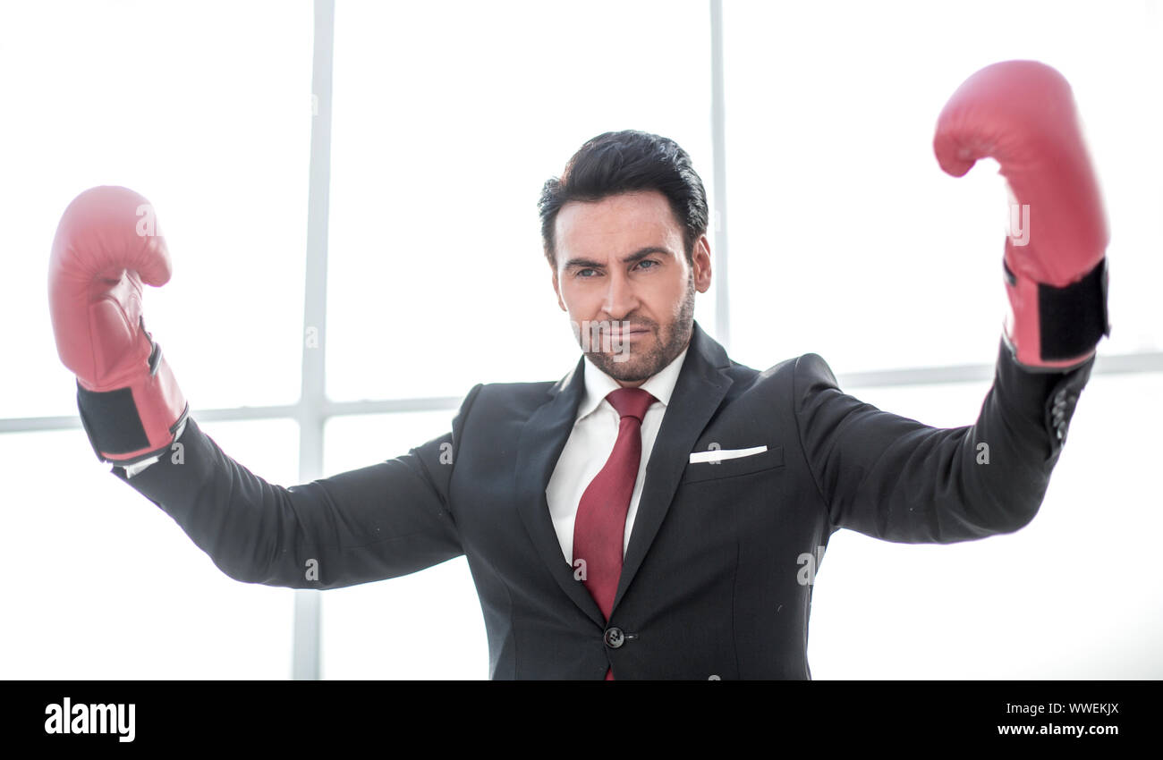 close up. the winner is a businessman in Boxing gloves Stock Photo - Alamy