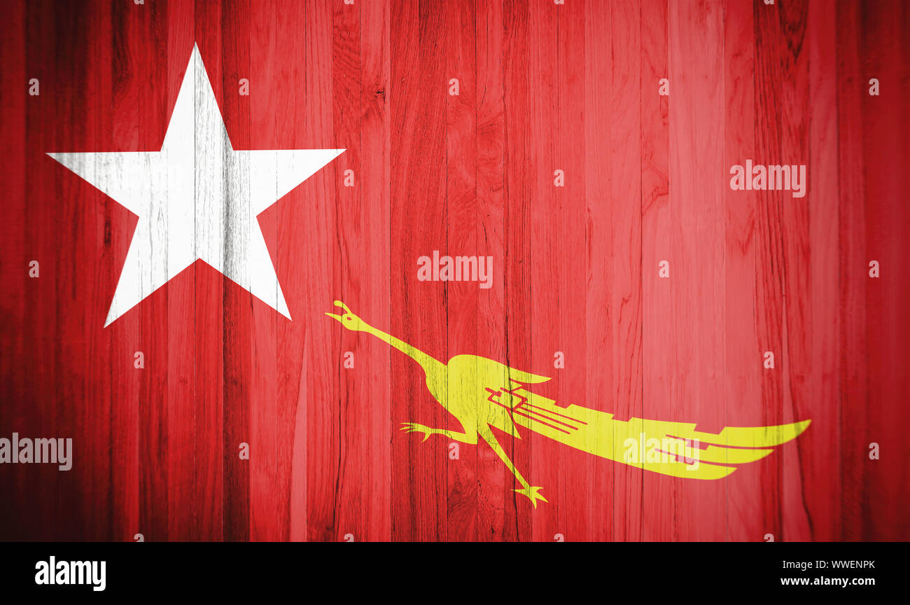 Flag of National League for Democracy (NLD flag), wooden background ...
