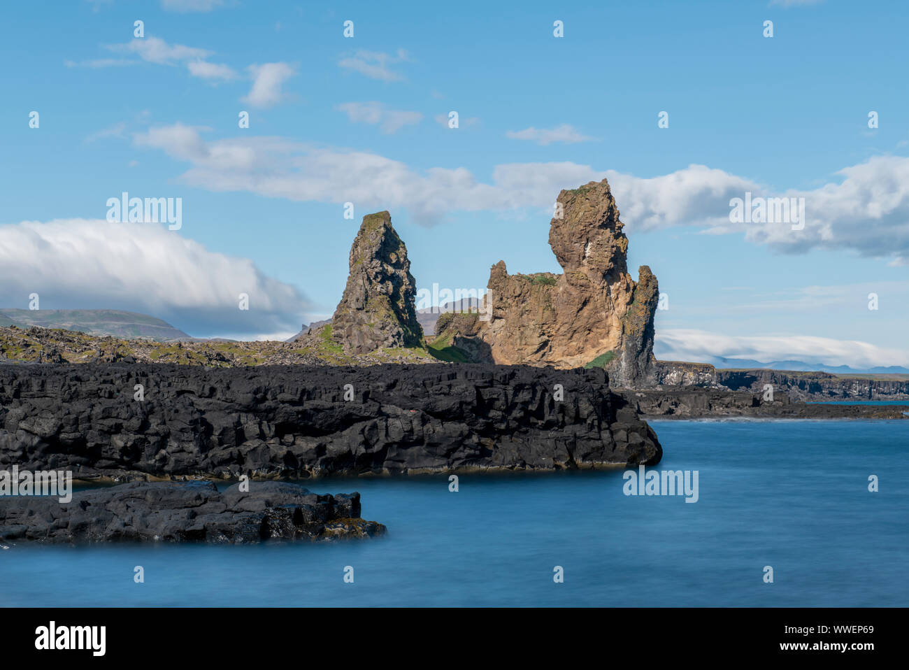 Lóndrangar impressive rock formation on the West shores of Iceland on a ...