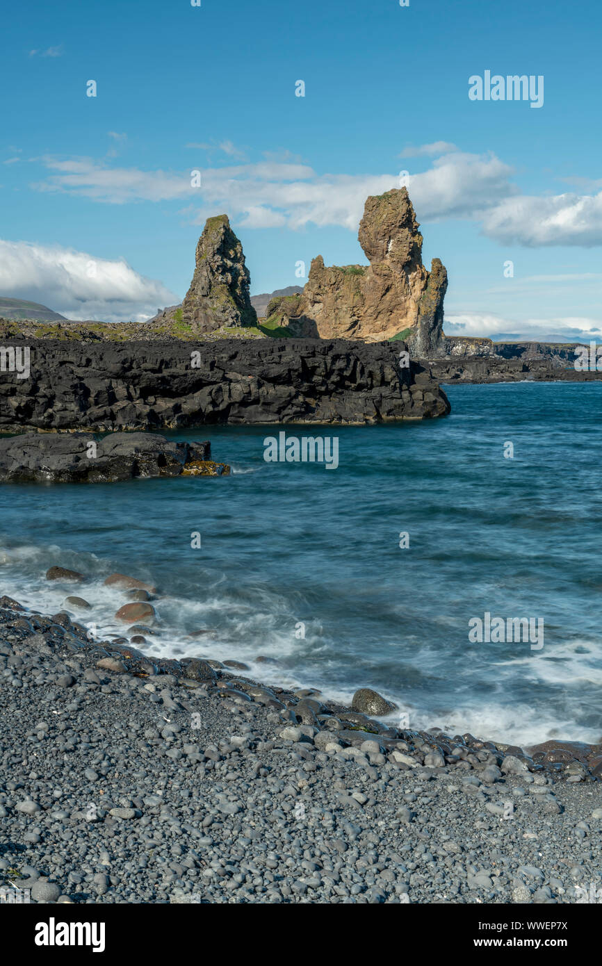 Lóndrangar impressive rock formation on the West shores of Iceland on a ...