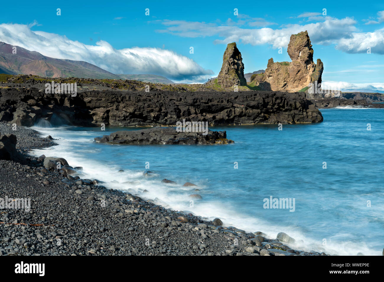 Lóndrangar impressive rock formation on the West shores of Iceland on a ...