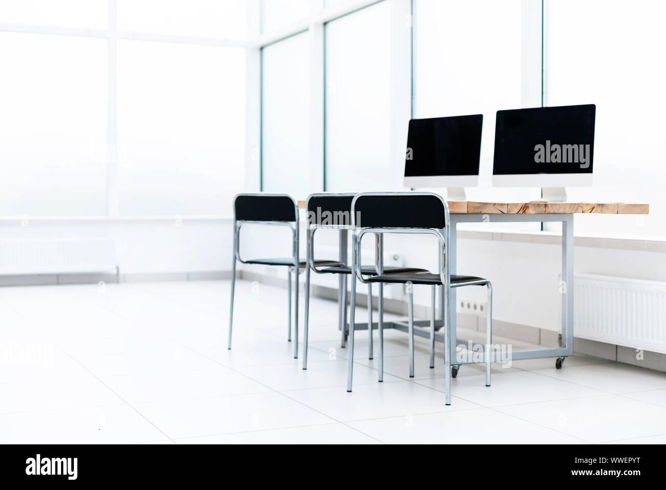 workplace business team in an empty office Stock Photo - Alamy