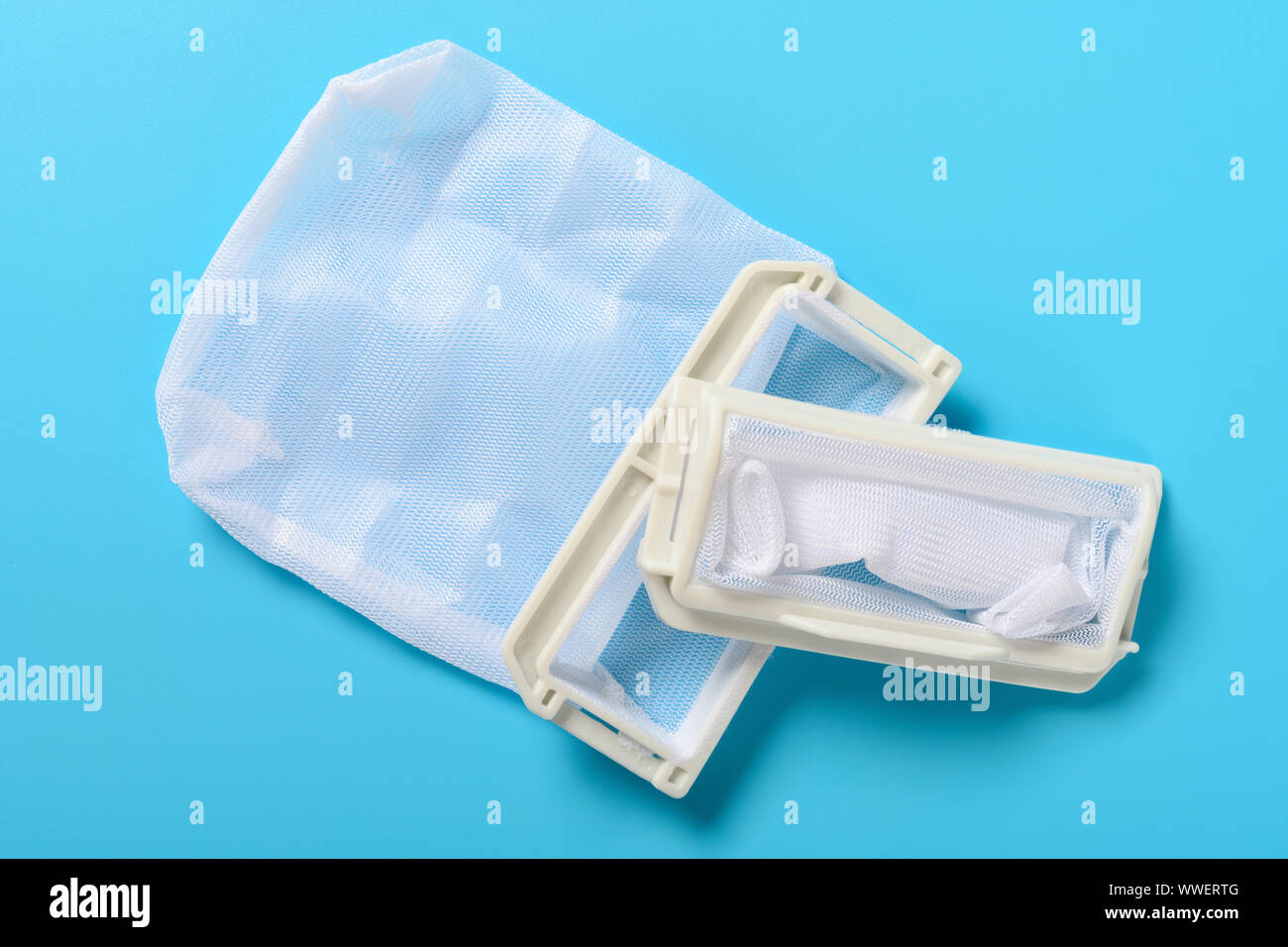 top view dust collectors for washing machine on blue background Stock ...