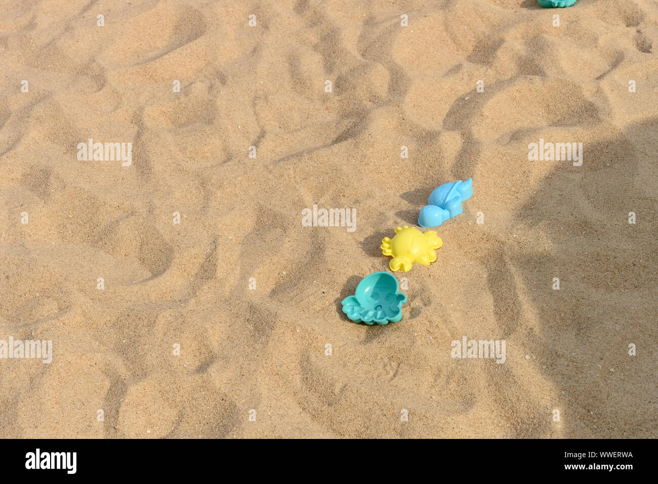 Plastic toys in sand beach hi-res stock photography and images - Alamy