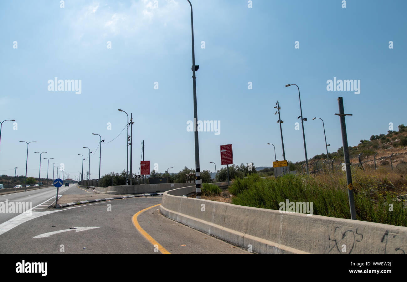 ISRAEL - AUGUST 30, 2019: View of Red Warning Sign in 3 Languages in ...