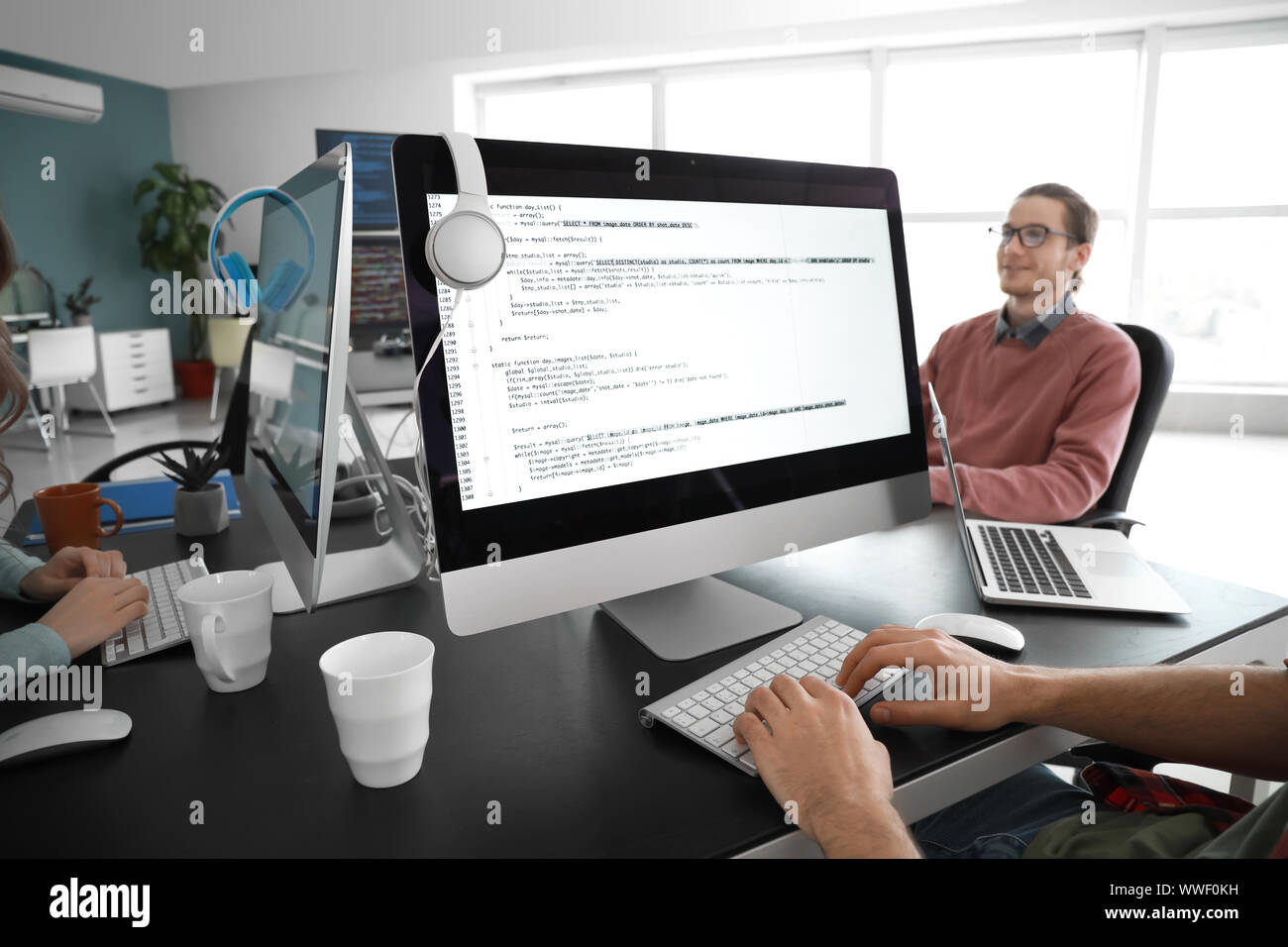 Female programmers working table hi-res stock photography and images - Alamy