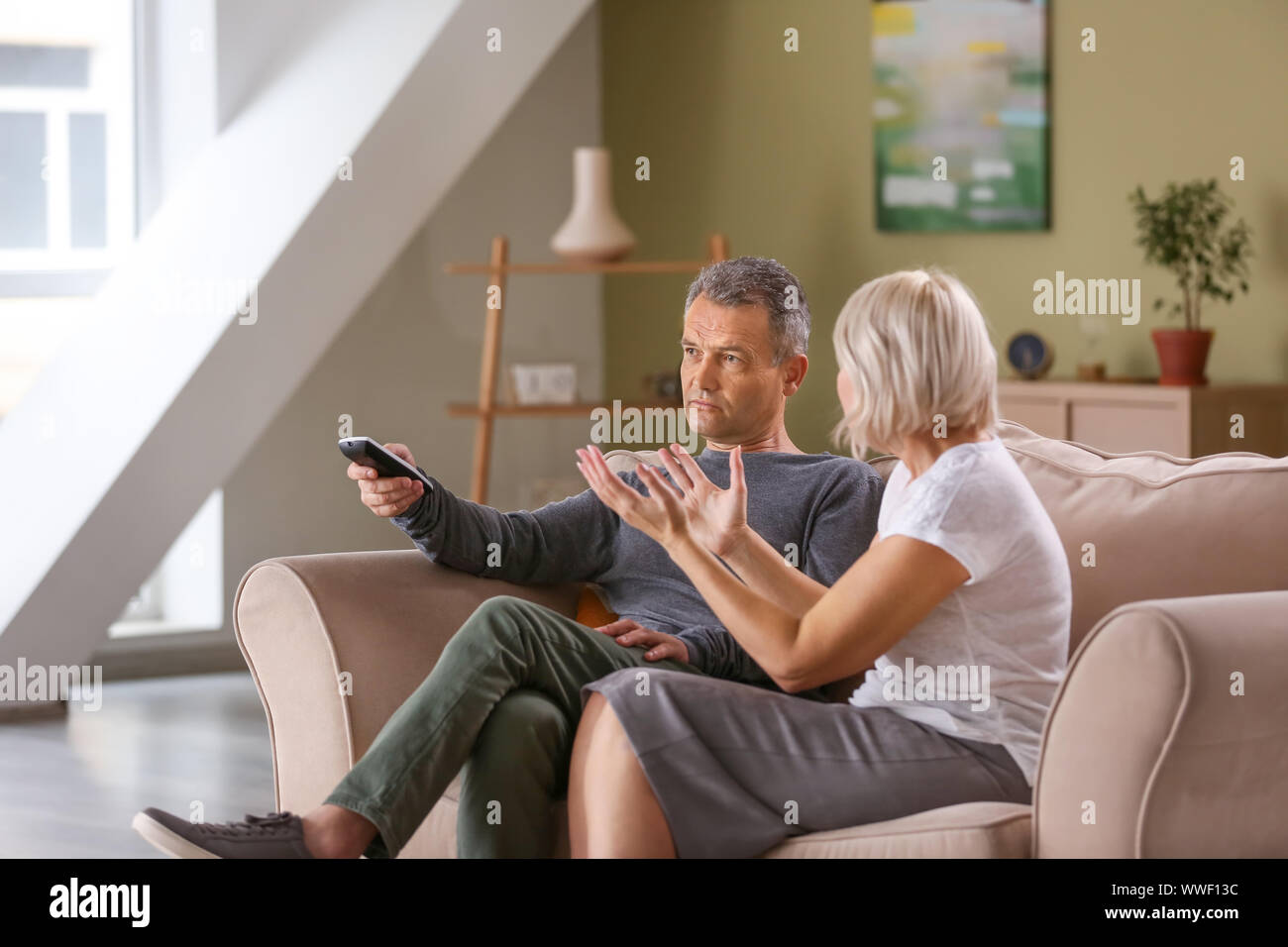 Angry wife scolding sad hi-res stock photography and images - Alamy