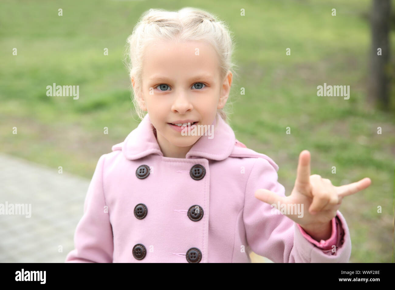 Child using sign language hi-res stock photography and images - Alamy