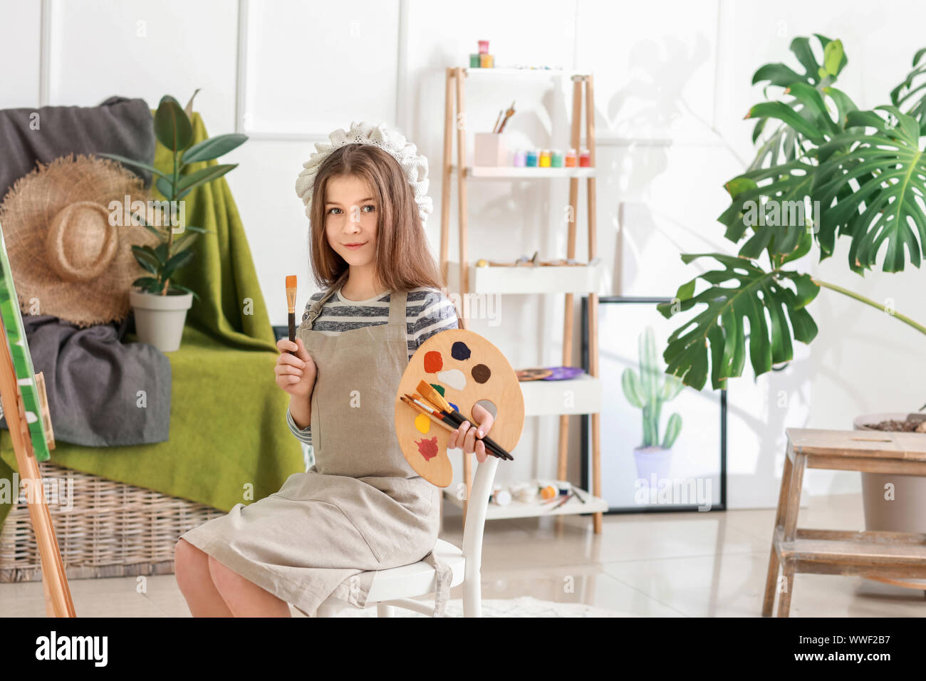 Cute little artist in studio Stock Photo - Alamy