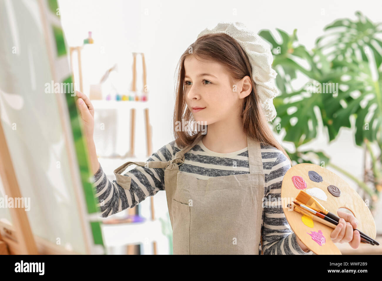Cute little artist in studio Stock Photo - Alamy