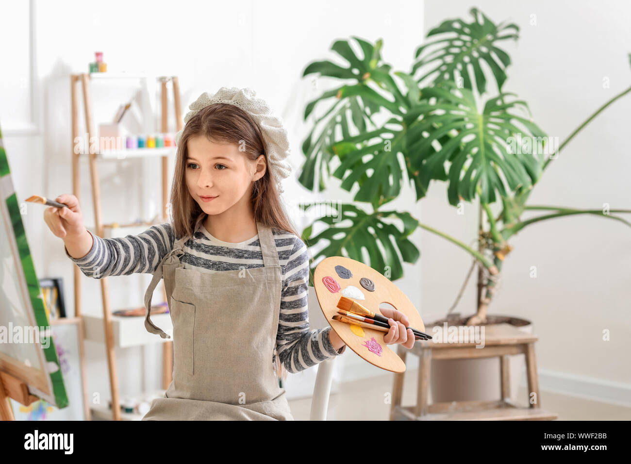 Cute little artist in studio Stock Photo - Alamy