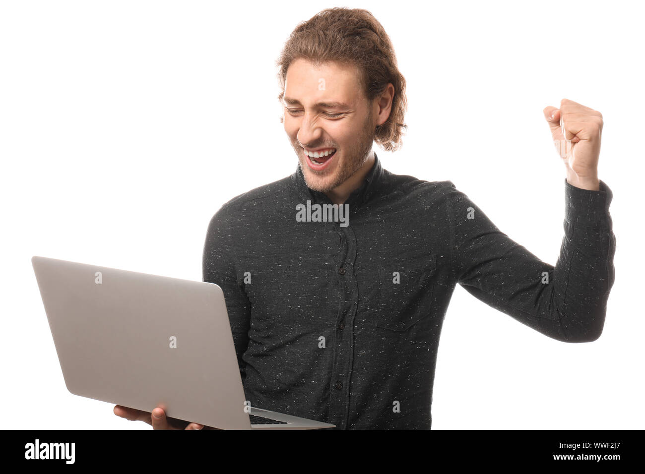 Happy male programmer with laptop on white background Stock Photo - Alamy