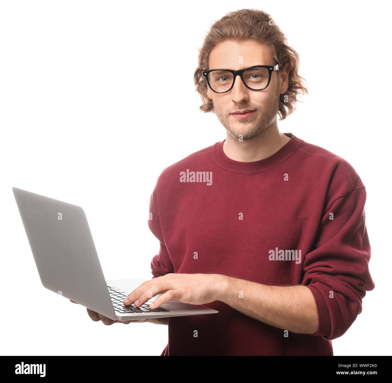 Male programmer with laptop on white background Stock Photo - Alamy
