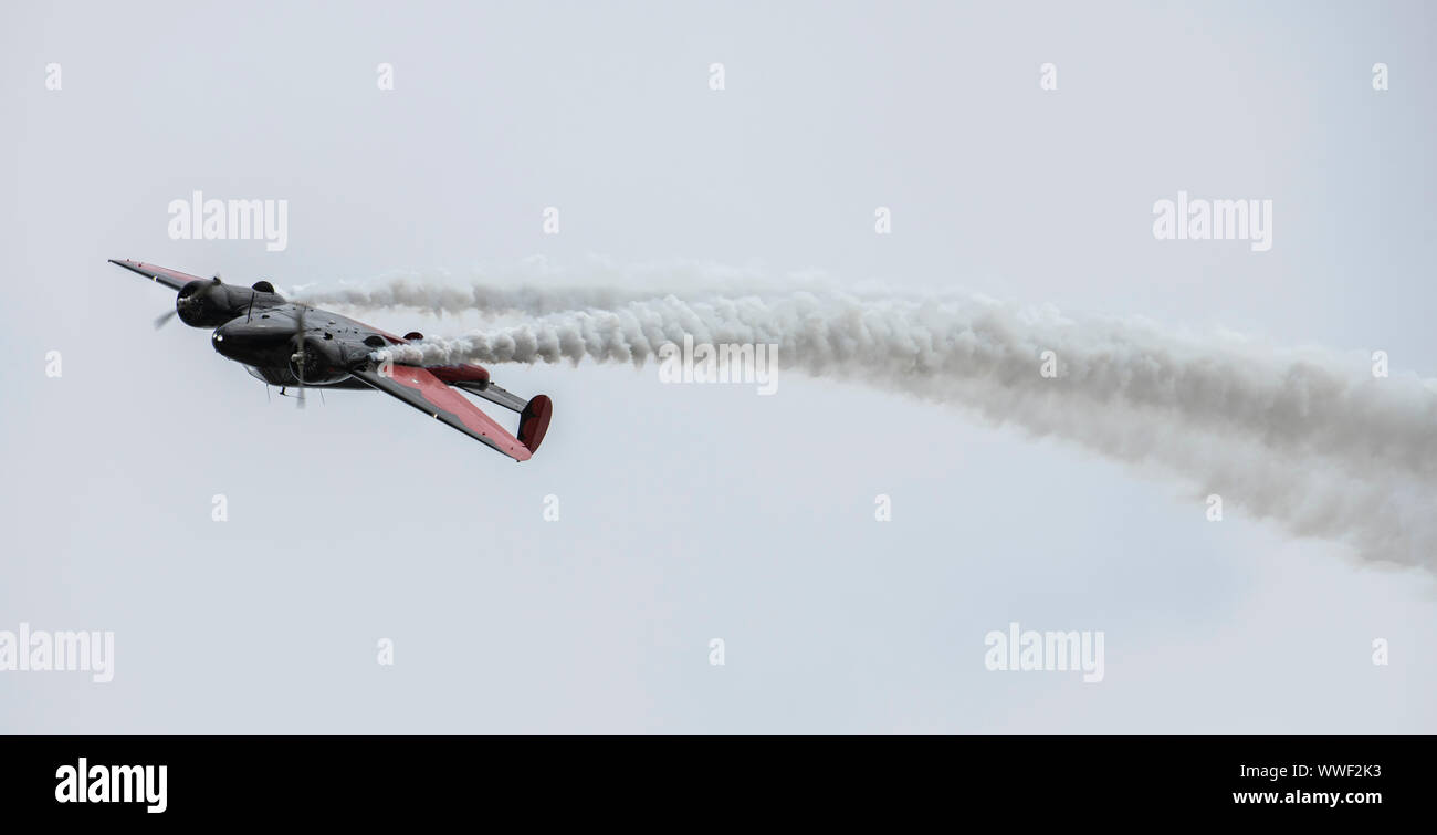 A Twin Beech 18 aerobatic aircraft, piloted by Matt Younkin, performs ...