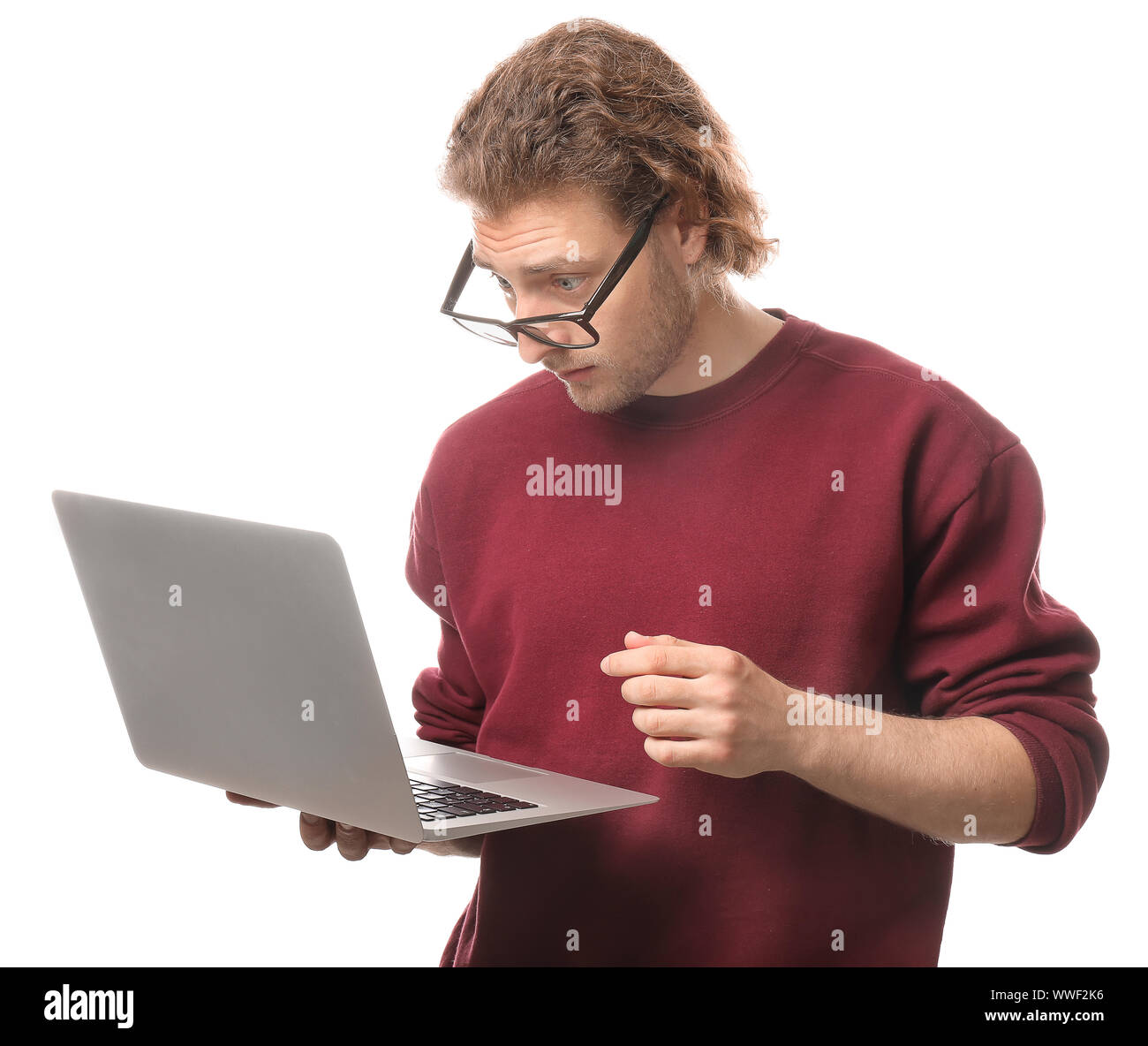 Male programmer with laptop on white background Stock Photo - Alamy