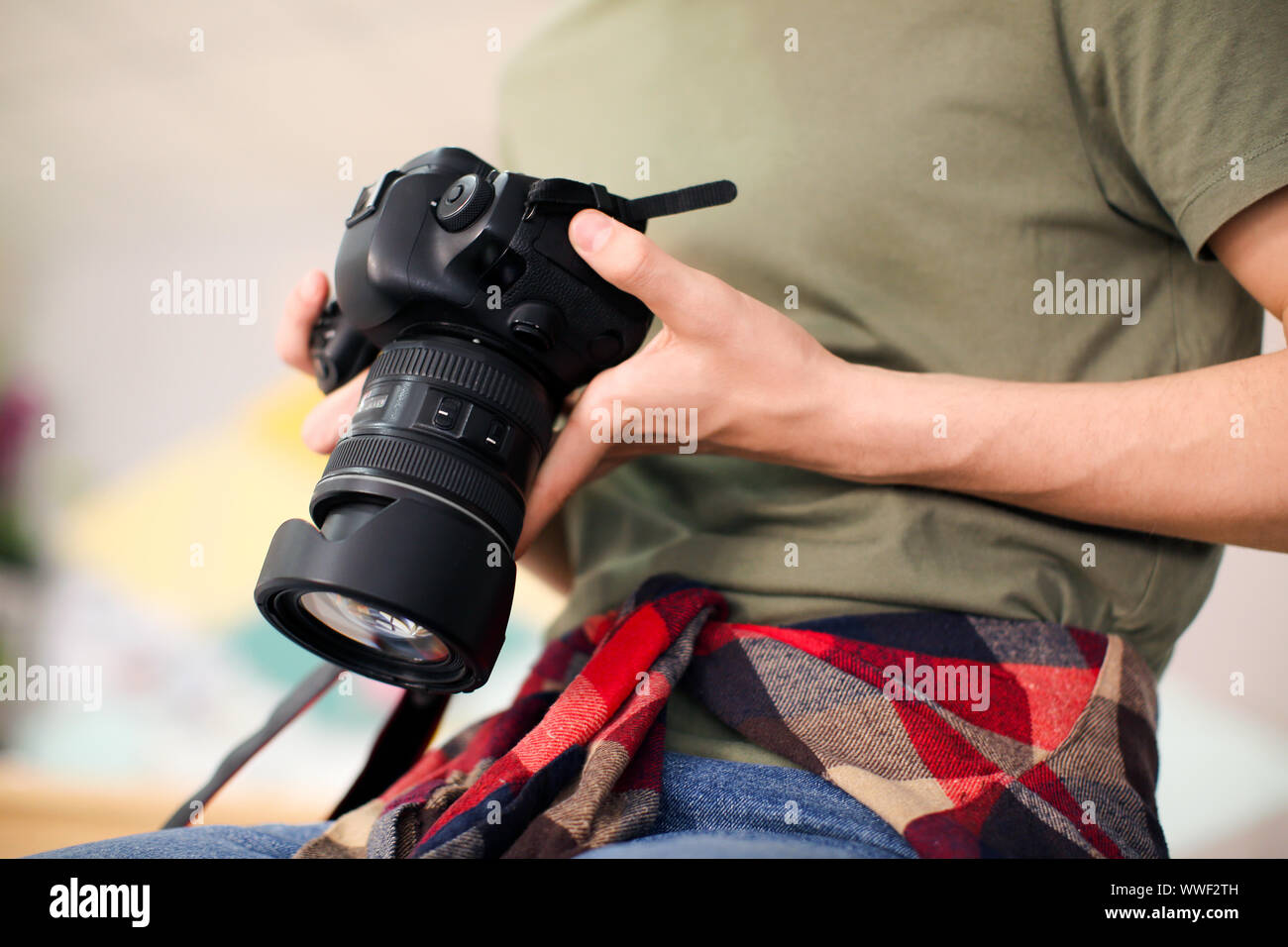 Teenage photographer in professional studio, closeup Stock Photo - Alamy