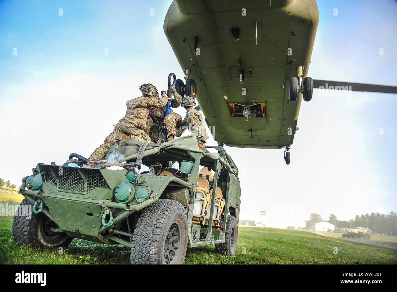 U.S. Army paratroopers assigned to the 173rd Airborne Brigade sling ...